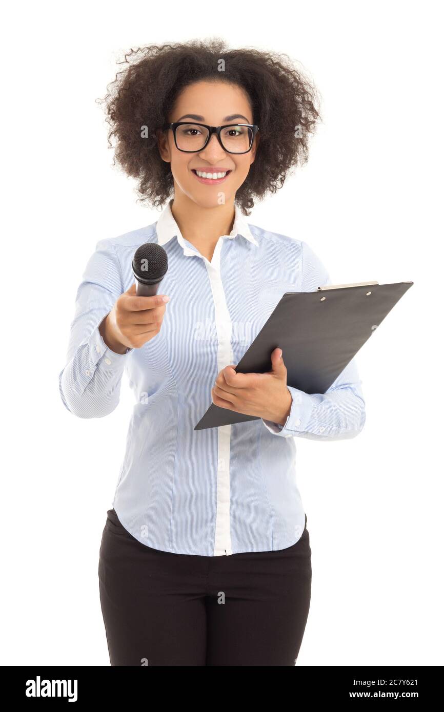 african american female journalist with microphone taking interview ...