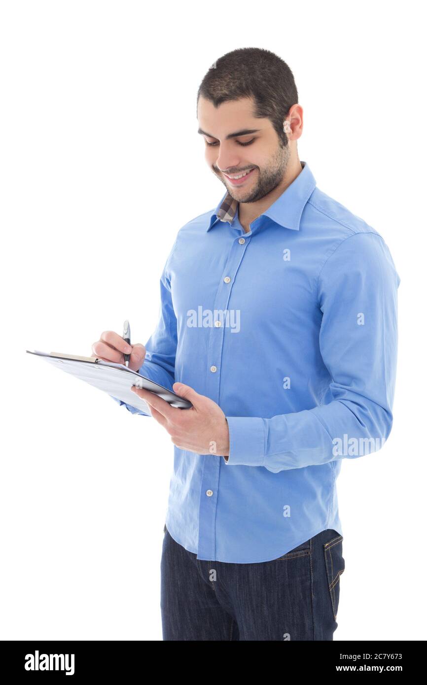 handsome arabic man writing something on clipboard isolated on white ...