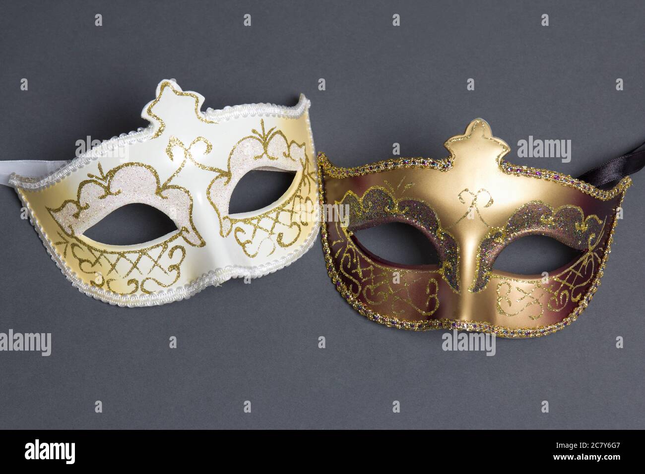 two beautiful carnival masks on grey background Stock Photo - Alamy