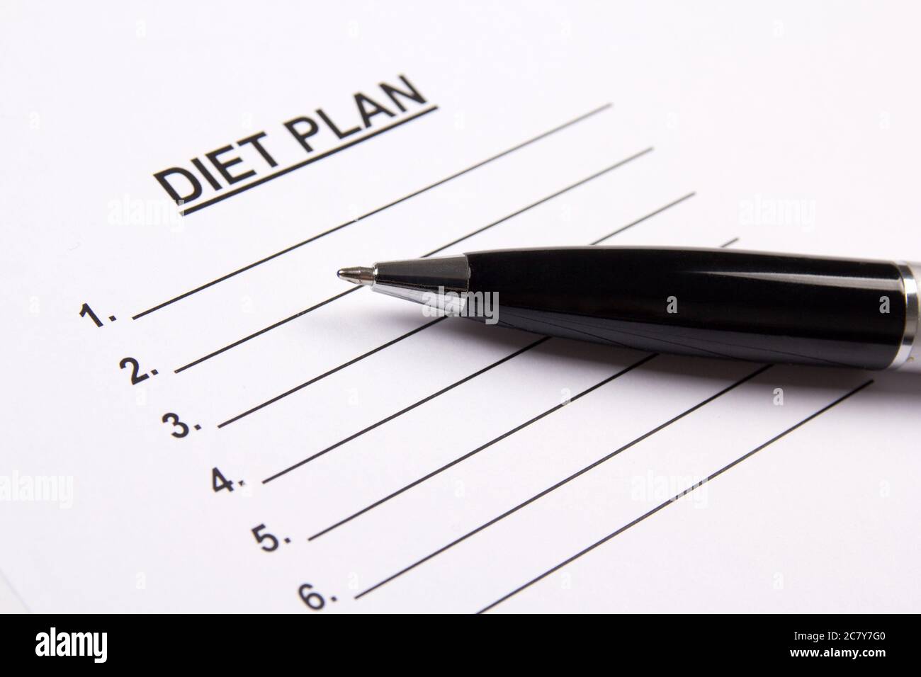 sheet of paper with diet plan and pen Stock Photo - Alamy