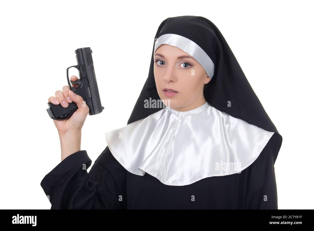 young woman nun with gun isolated on white background Stock Photo - Alamy