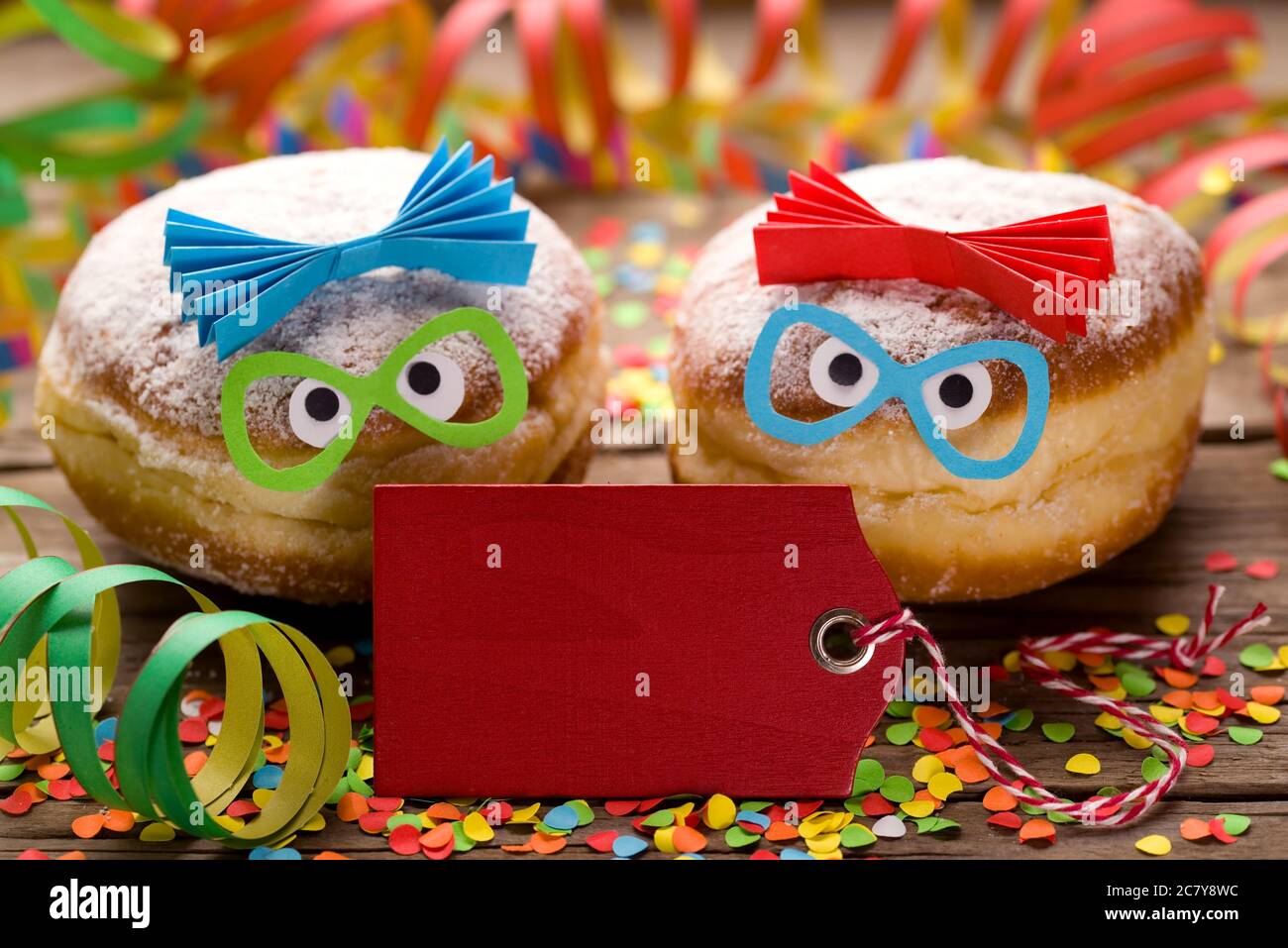 Carnival doughnuts with funny faces and copyspace Stock Photo - Alamy
