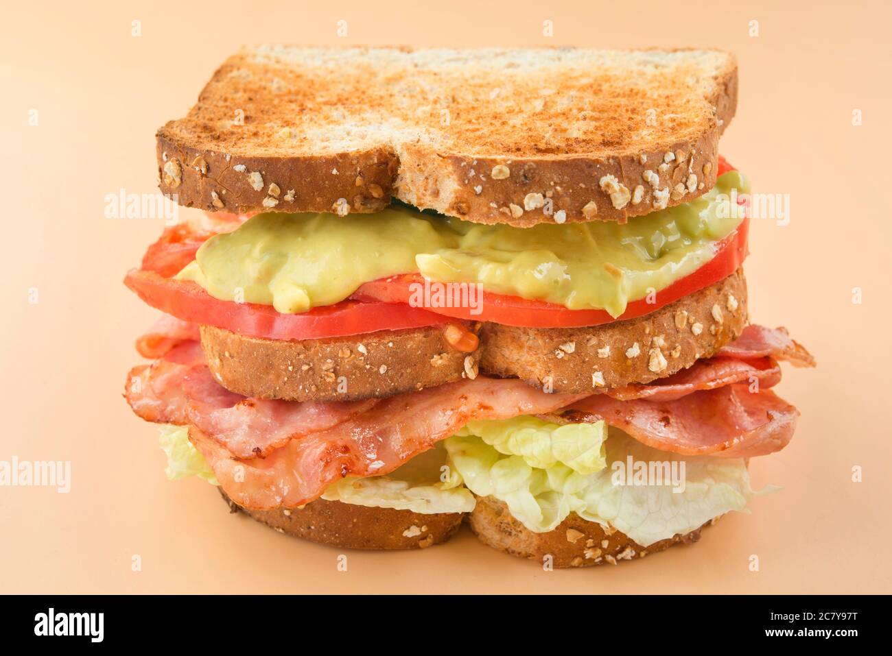 Sandwich LGBT lettuce, guacamole, bacon and tomato Stock Photo - Alamy