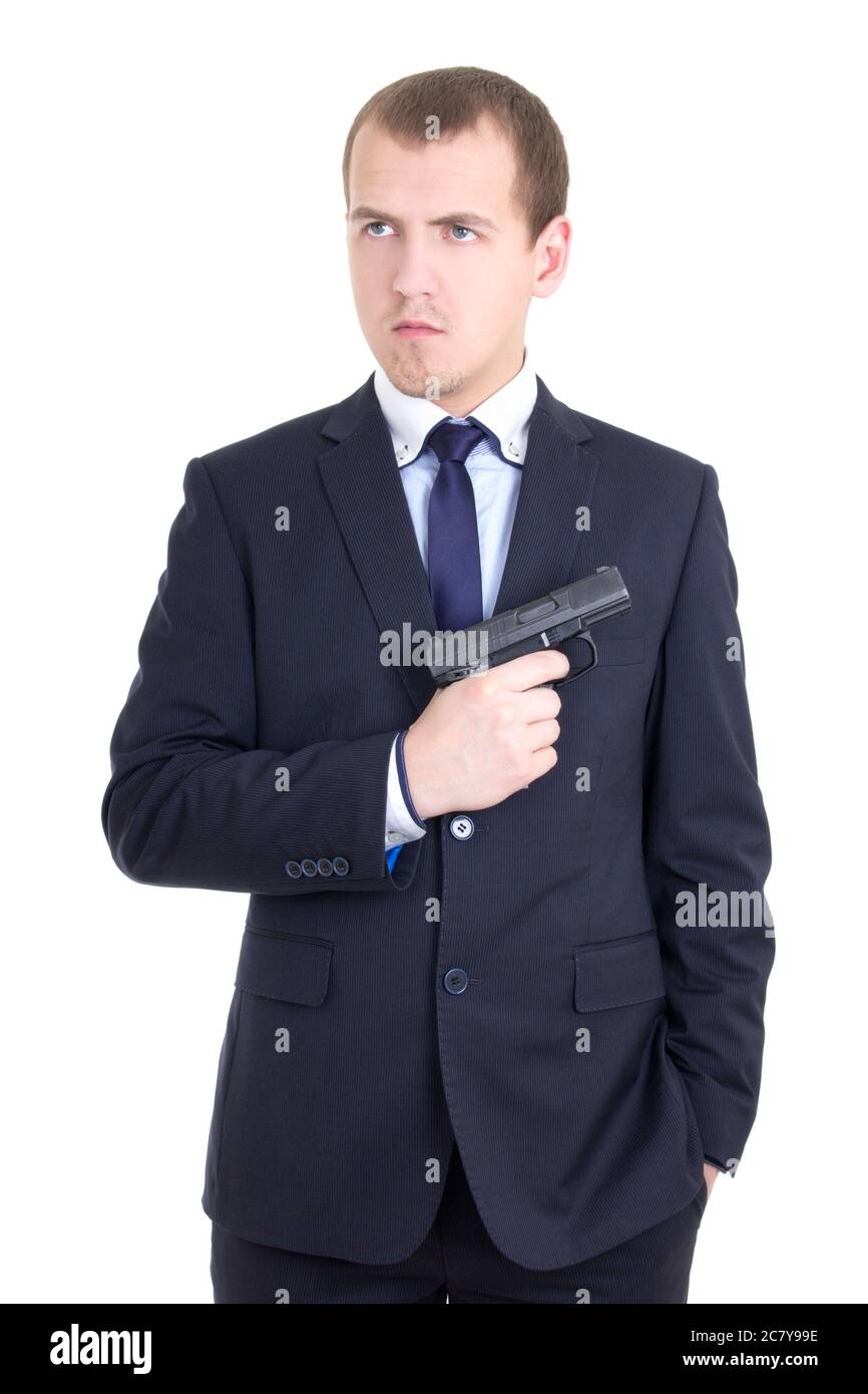serious man in business suit with gun isolated on white background ...