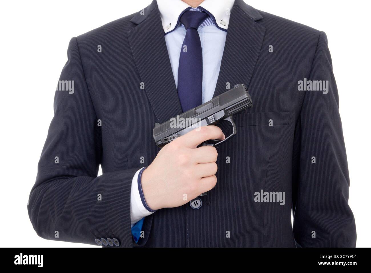 man in business suit with gun isolated on white background Stock Photo ...