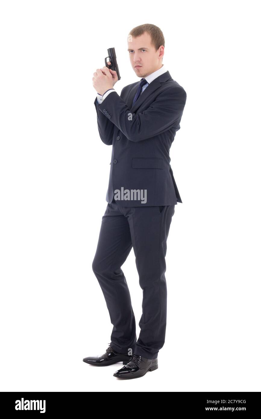 man in business suit posing with gun isolated on white background Stock ...