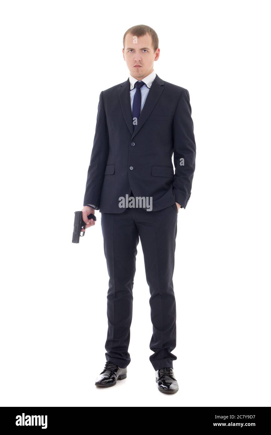 full length portrait of man in business suit with gun isolated on white ...