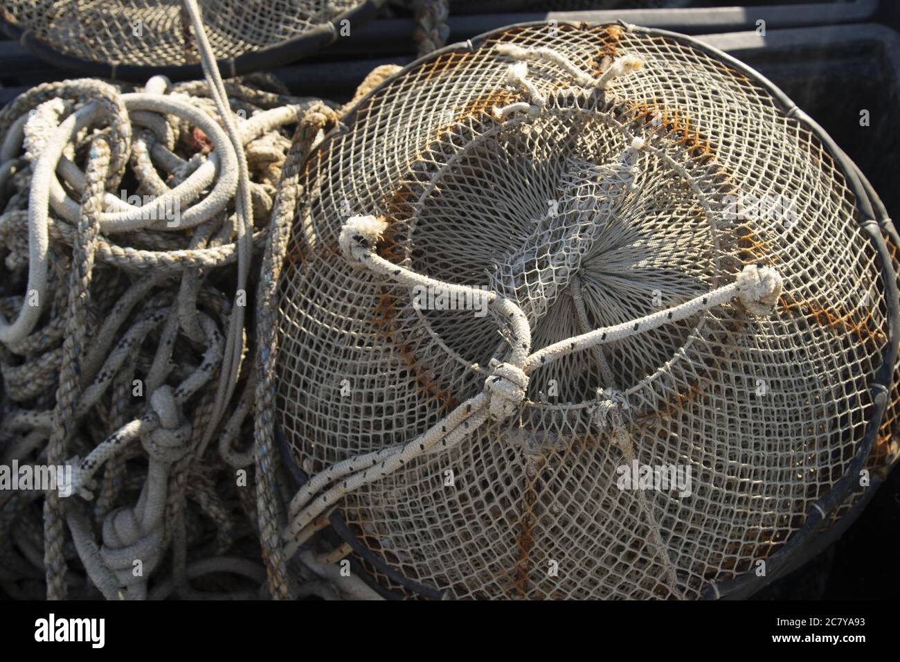 Some messy equipment, ropes, nets and floats arranged for fishing Stock ...