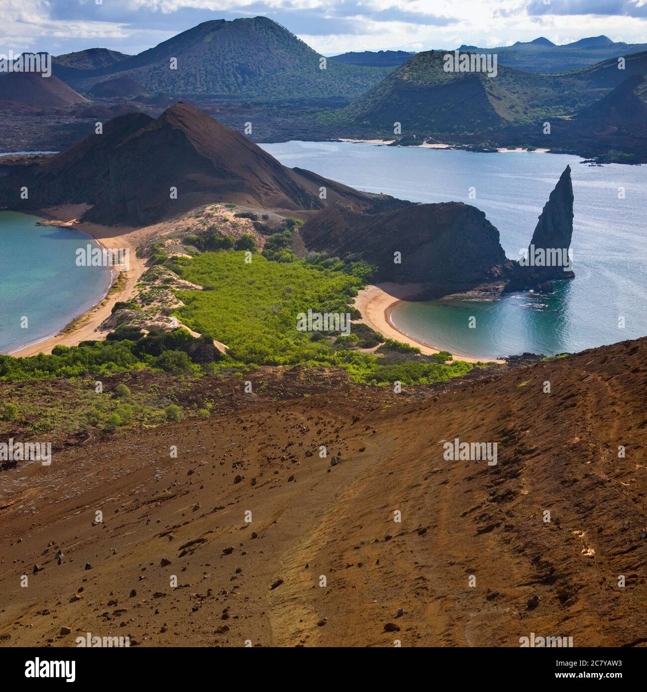 Pinnacle Rock and a volcanic landscape of cinder cones and lava fields ...