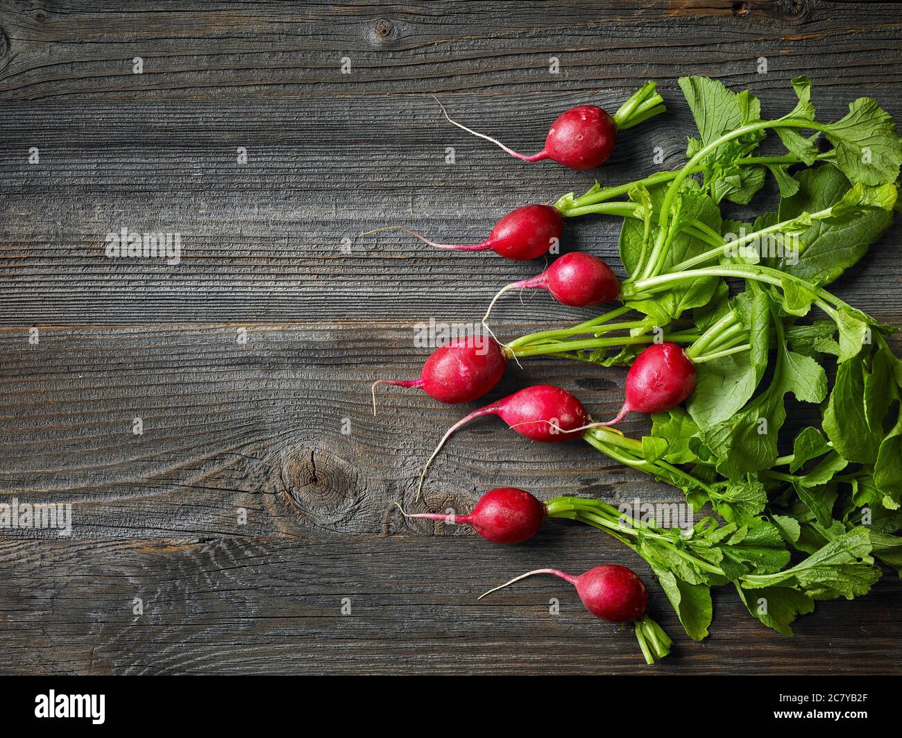 fresh raw radish on rustic kitchen table, top view Stock Photo - Alamy