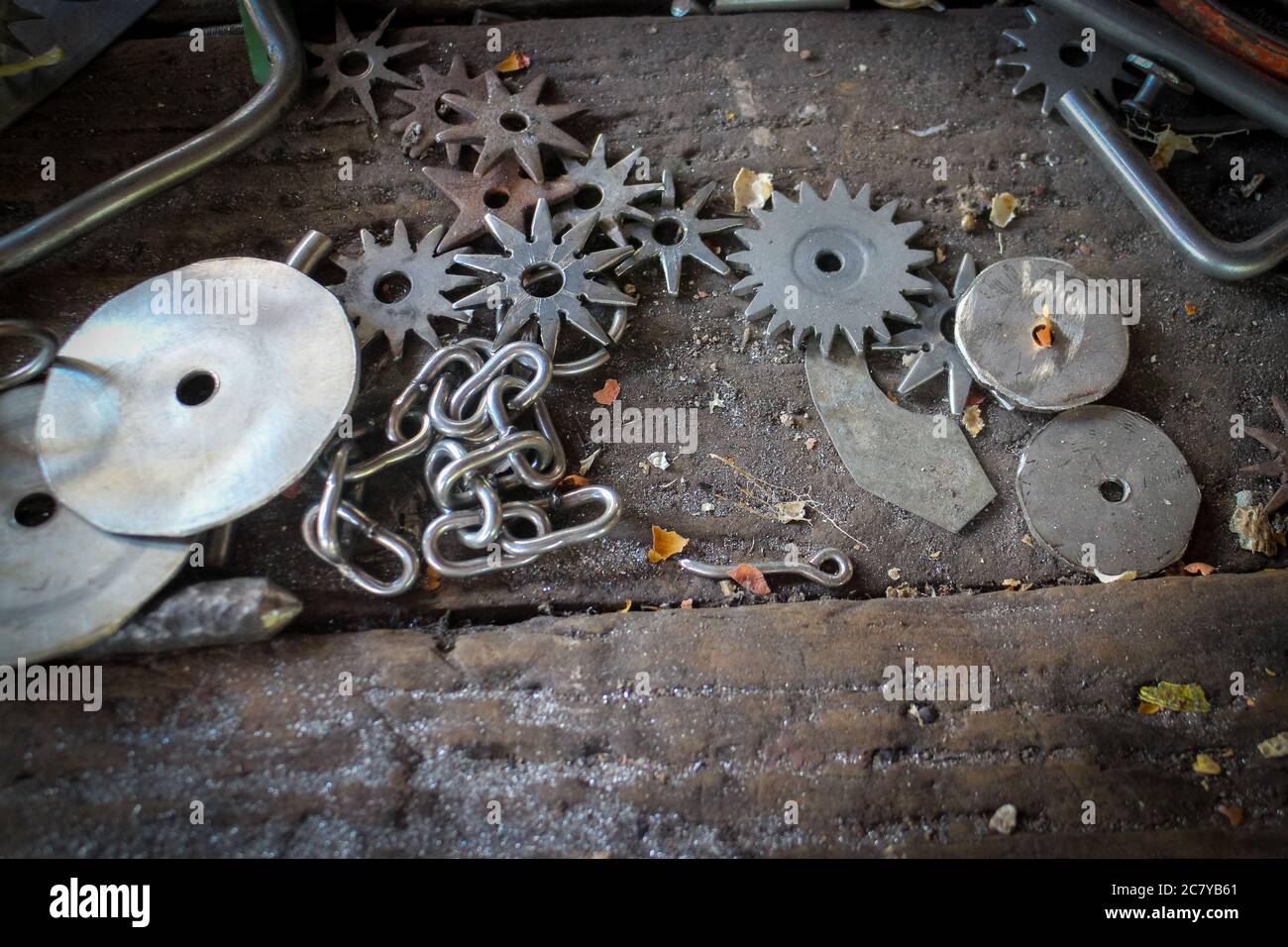Closeup shot of different types of gears on the ground Stock Photo - Alamy