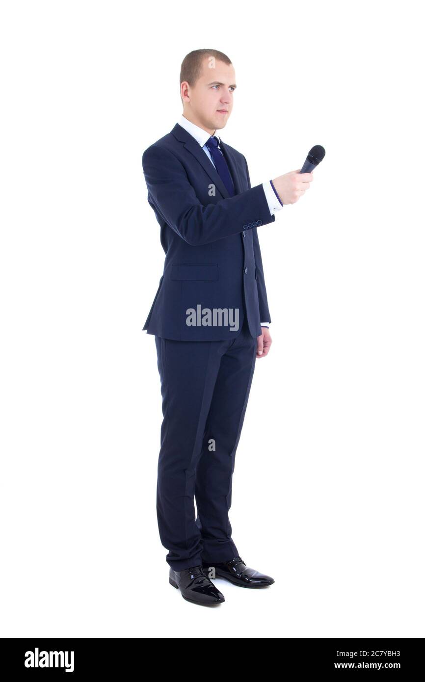 full length portrait of male reporter with microphone isolated on white ...