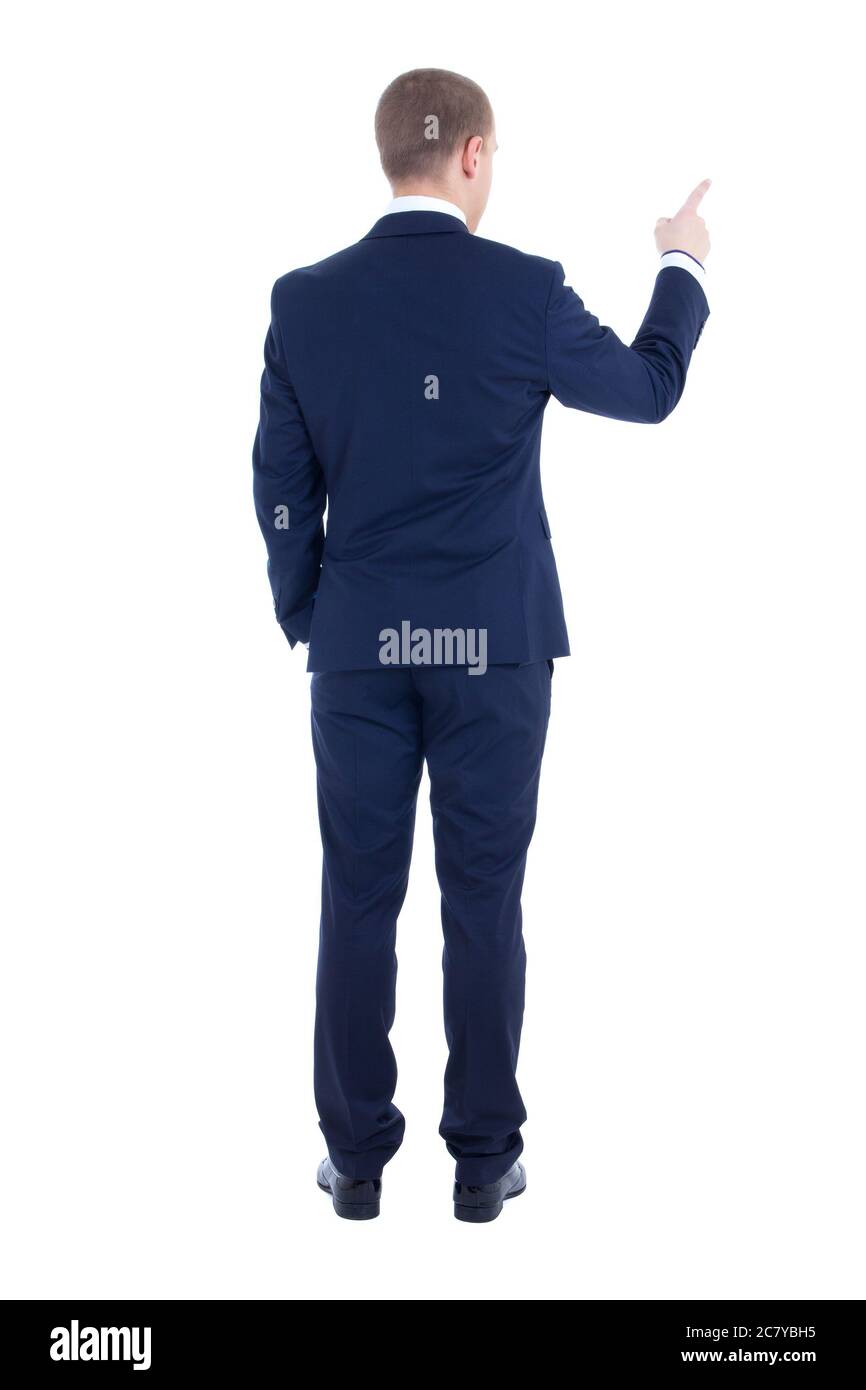 rear view of young business man pointing at something isolated on white ...