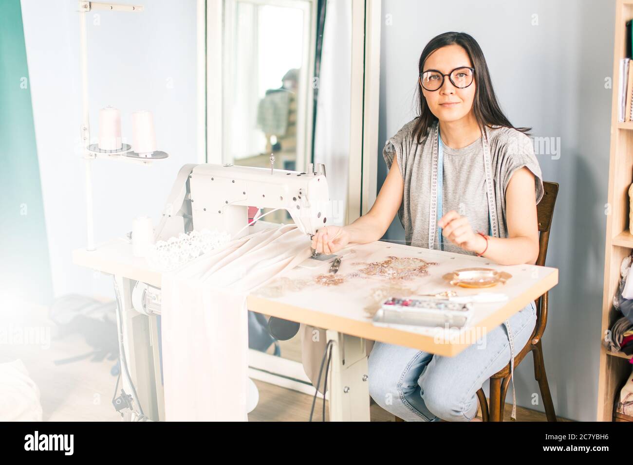 Young lady dressmaker Stock Photo - Alamy
