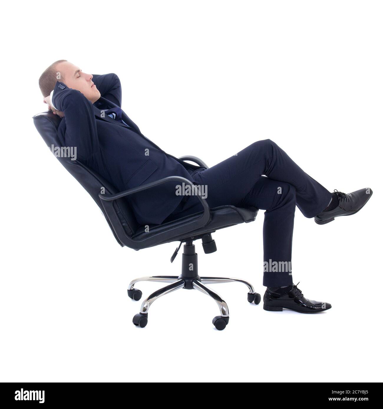 happy business man sitting on office chair isolated on white background ...