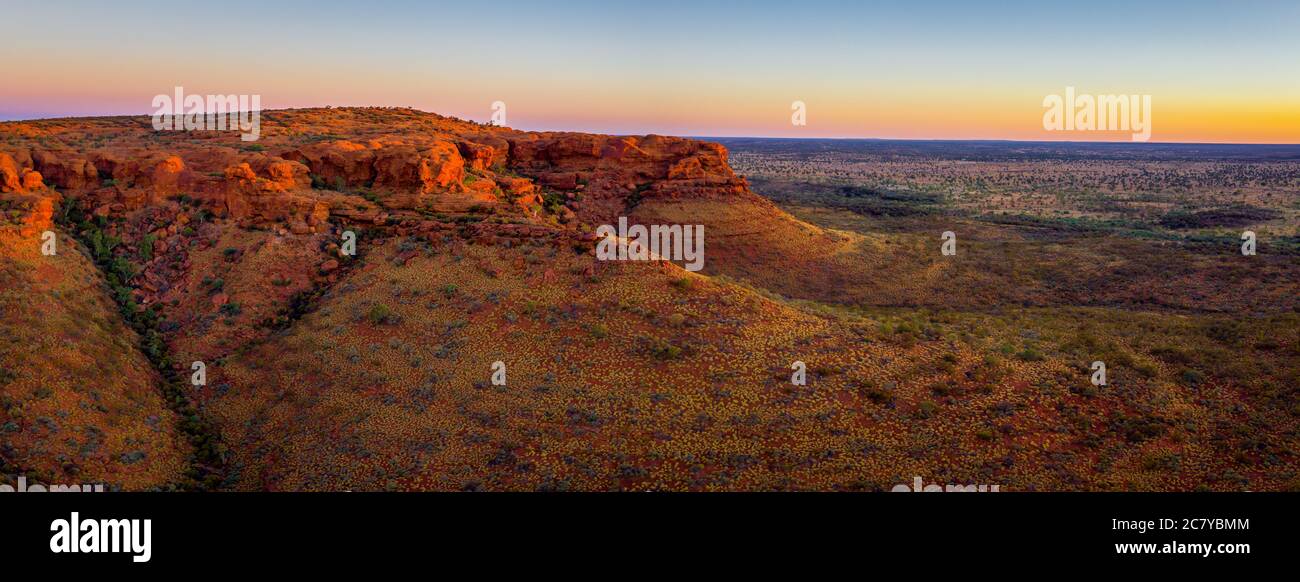 Beautiful red desert cliff in a sunset Stock Photo - Alamy