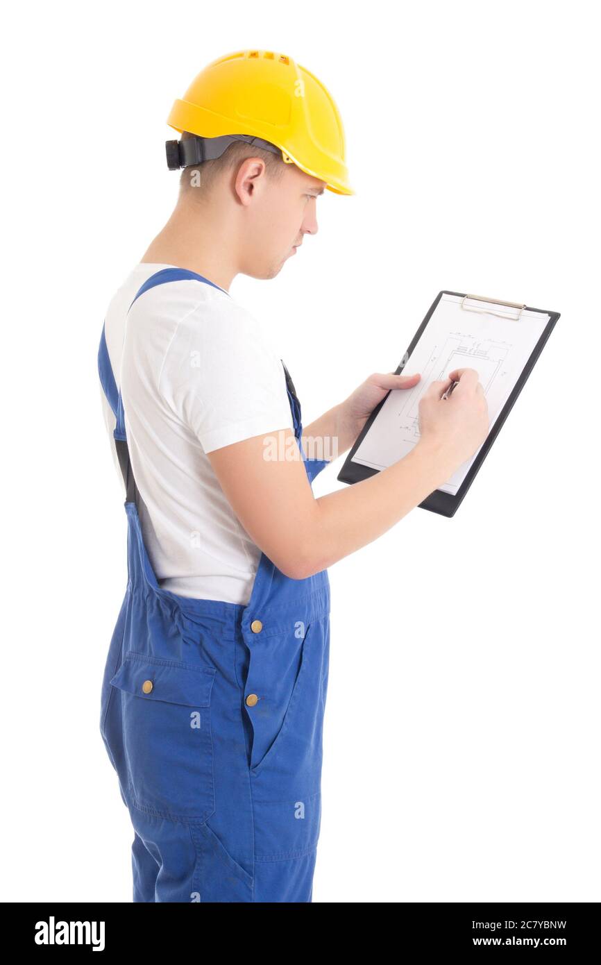 man builder in blue uniform writing something on blueprint isolated on ...
