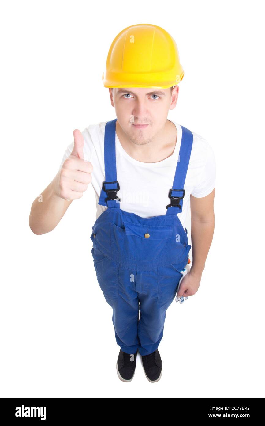 full length portrait of young handsome man builder in blue uniform ...
