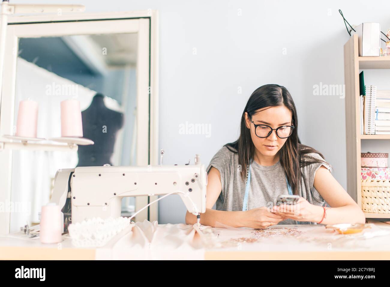 Young lady dressmaker Stock Photo - Alamy