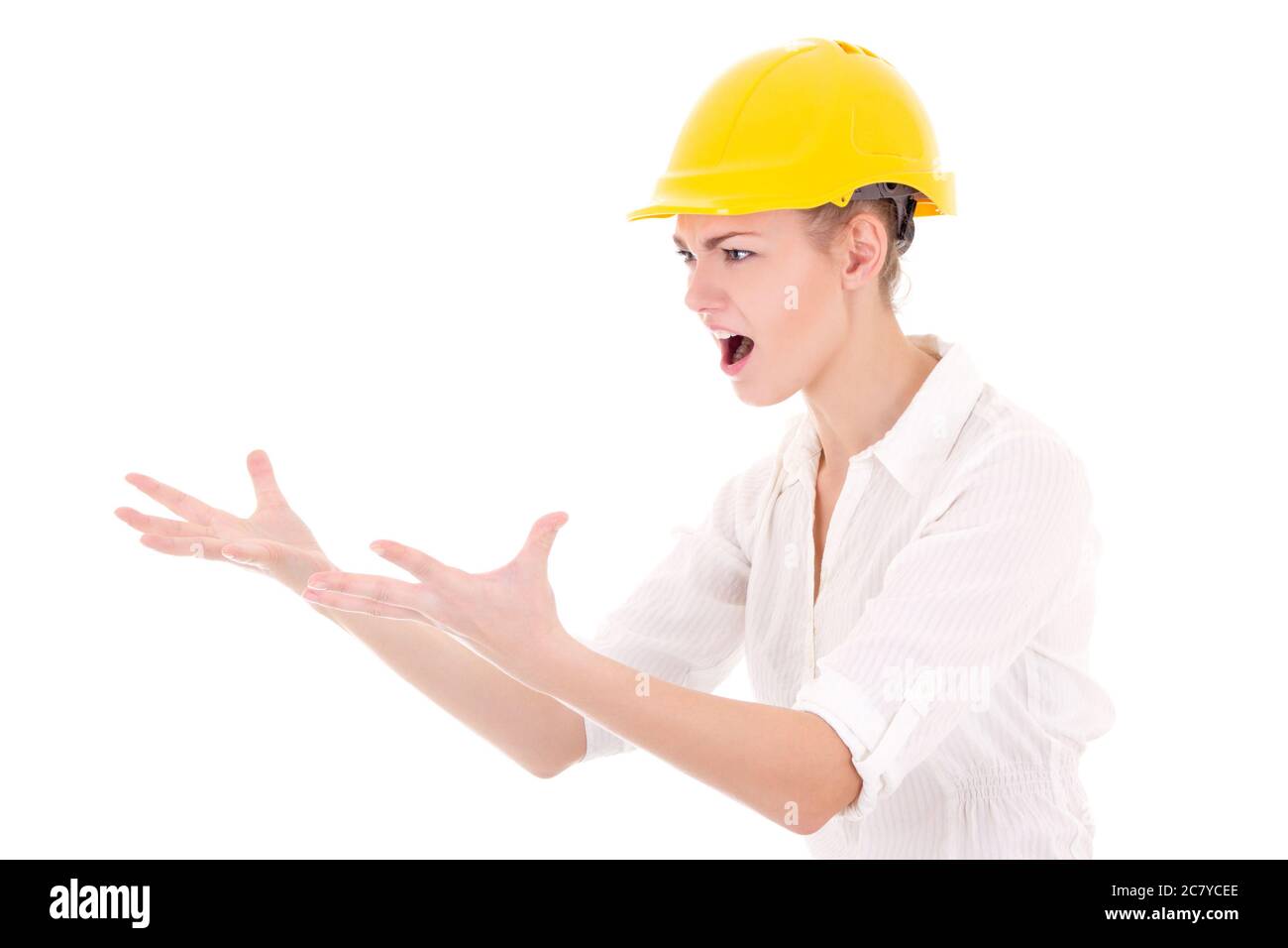 angry business woman architect in yellow builder helmet shouting ...