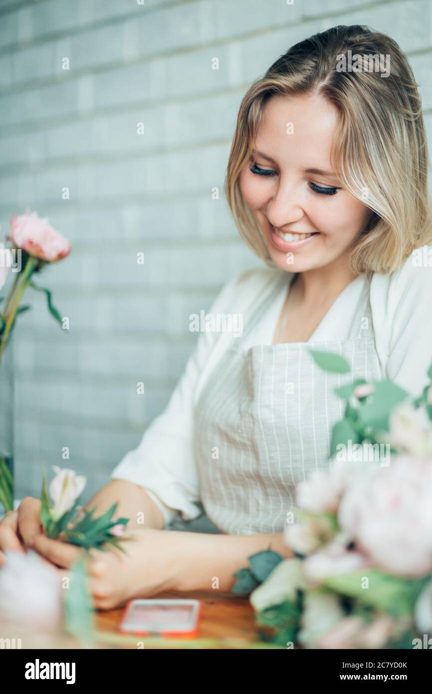 Male owner arranging order hi-res stock photography and images - Alamy