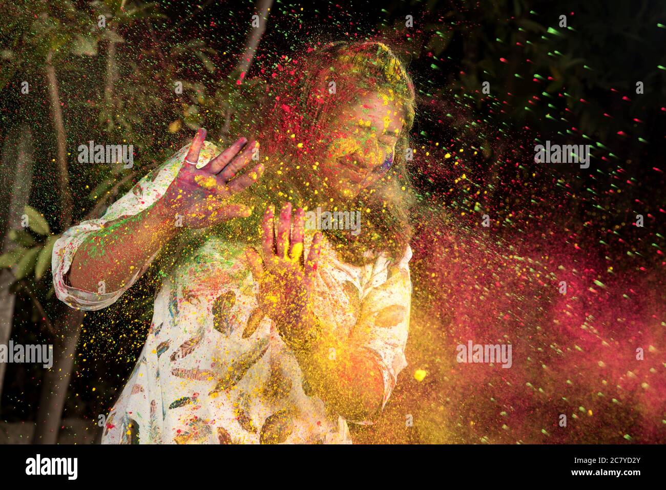 Young girl plays with colors on the occasion of Holi. Concept for ...