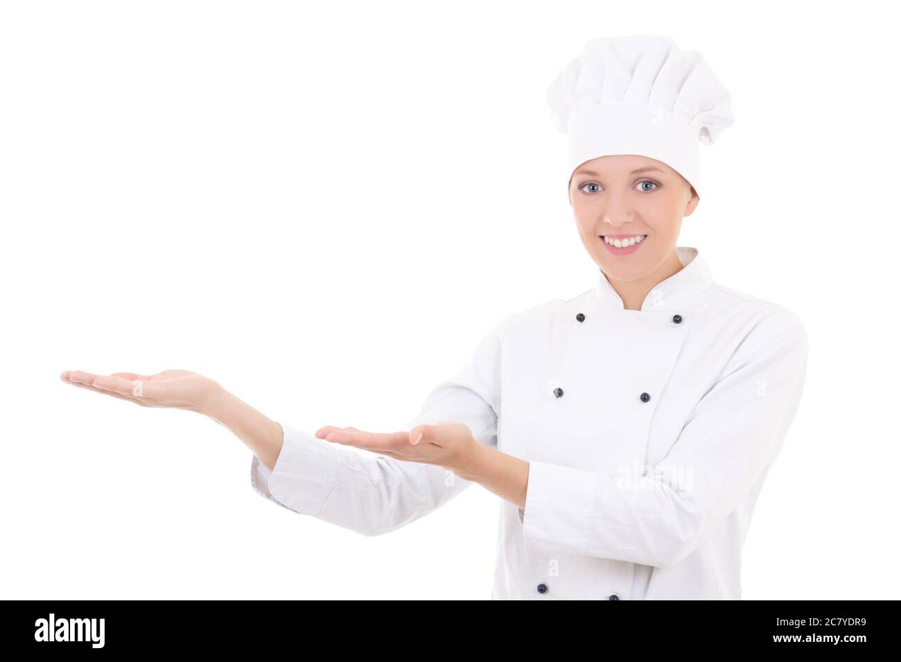 young woman chef showing or presenting something isolated on white ...