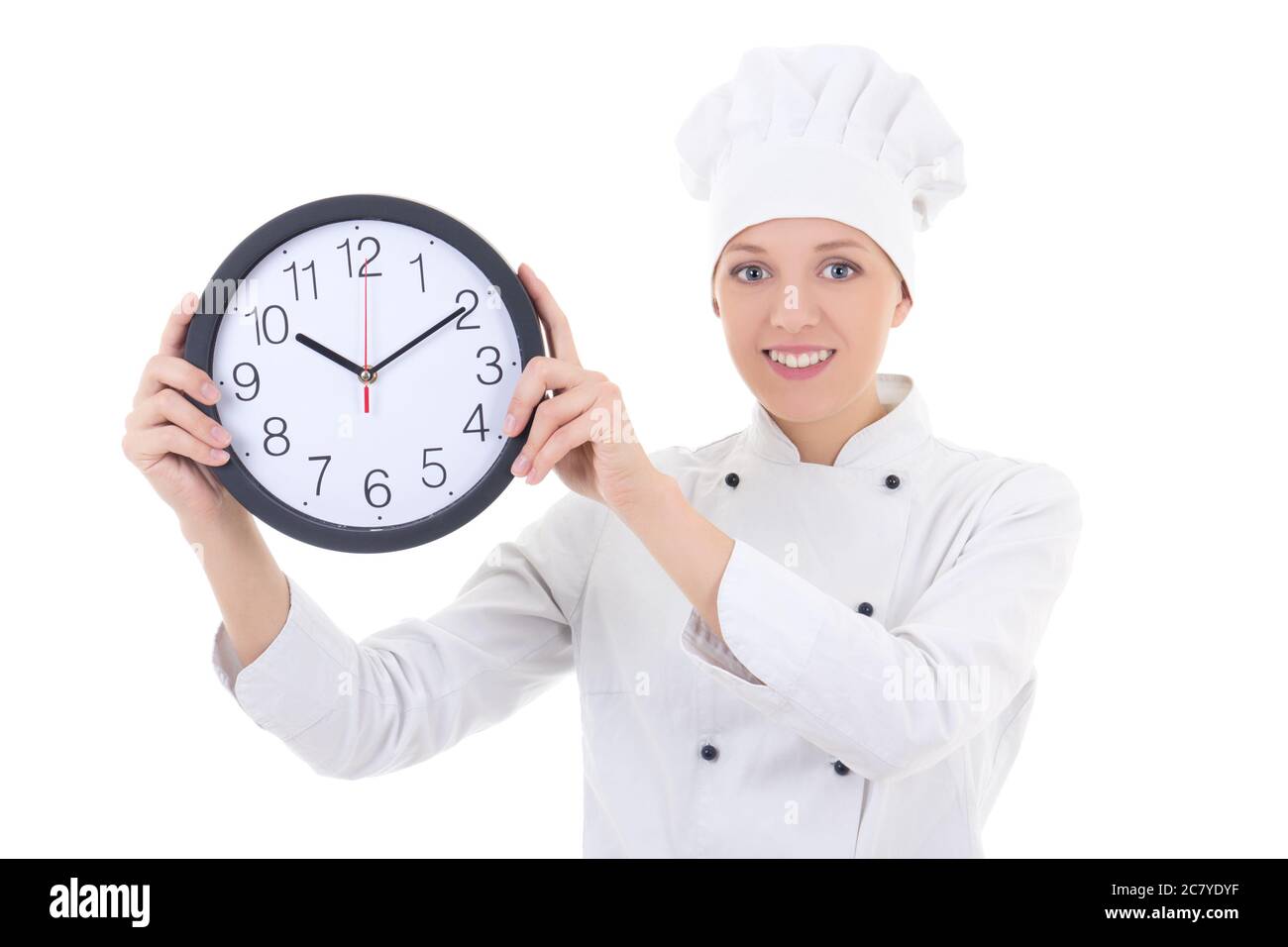 young happy woman chef in uniform holding office clock isolated on ...