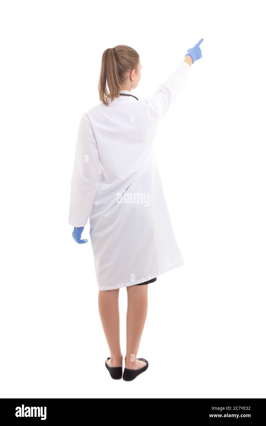 back view of young woman doctor pointing at something isolated on white ...