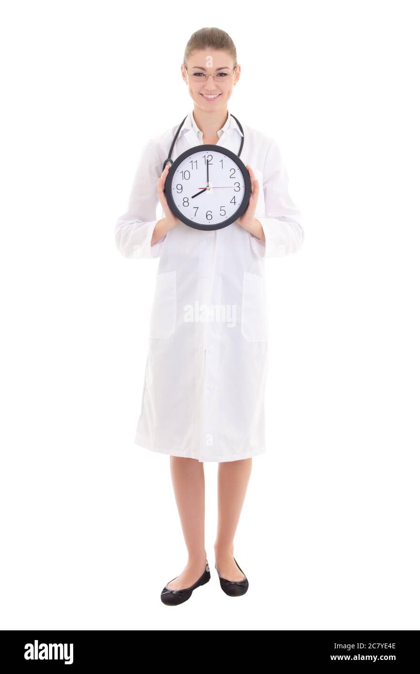 happy young female doctor holding office clock isolated on white ...