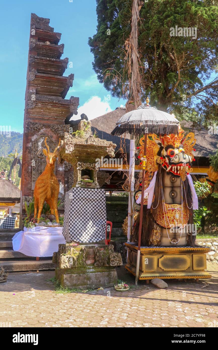 A statue of Barong in a Hindu temple that represents good and positive ...