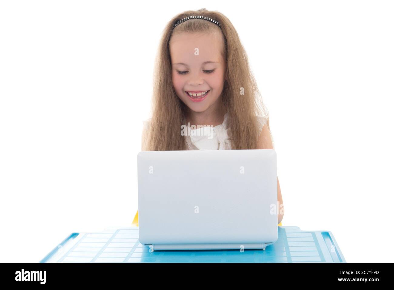 funny little girl using computer isolated on white background Stock ...