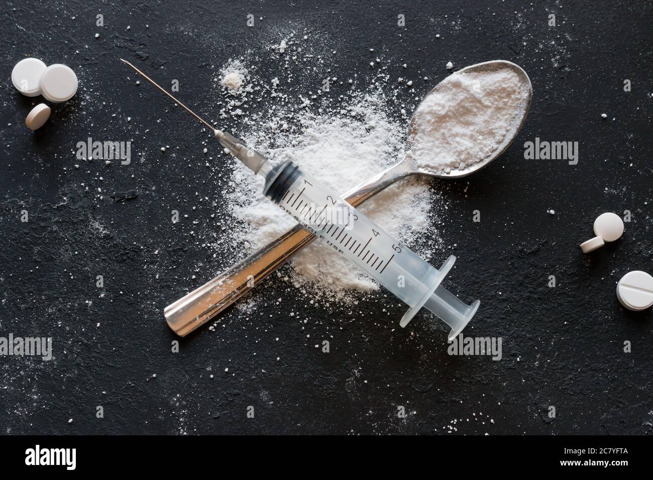 spoon and syringe in the form of a cross. Concept stop drug addiction ...