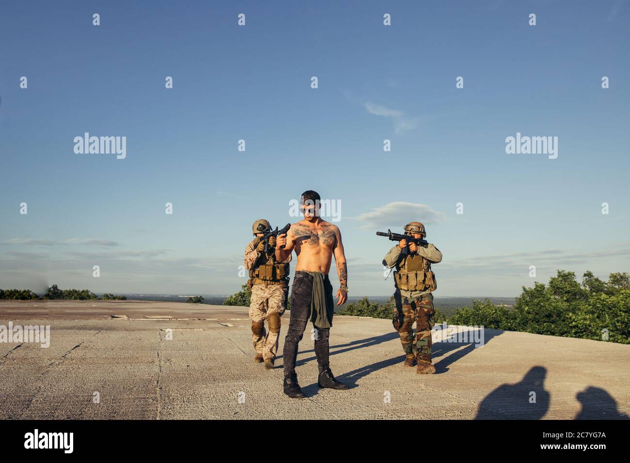 american soldiers squad with weapon captured hostage Stock Photo - Alamy