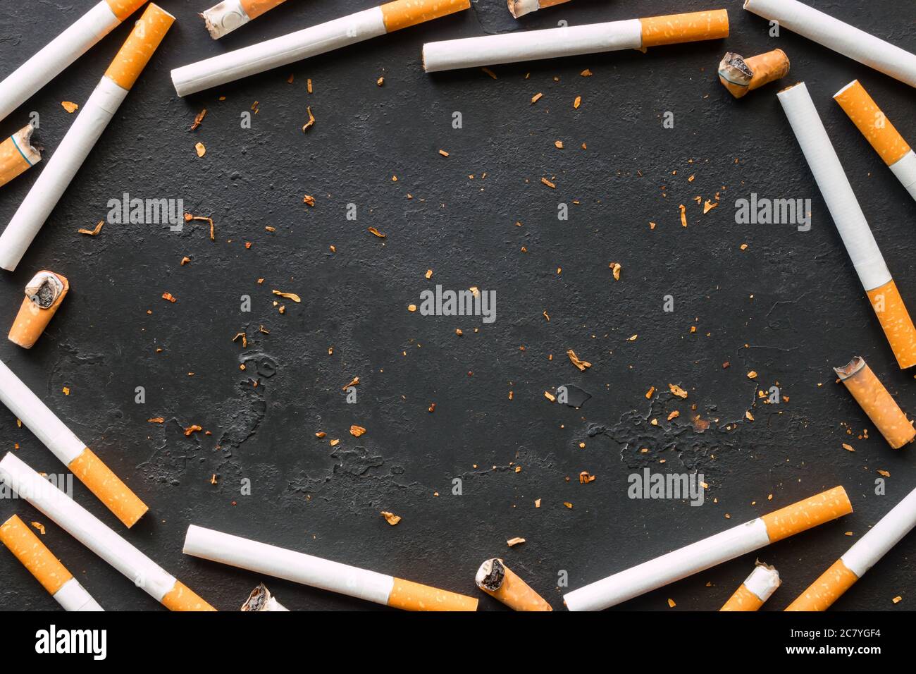 Frame of cigarettes, tobacco and cigarette butts mockup Stock Photo - Alamy