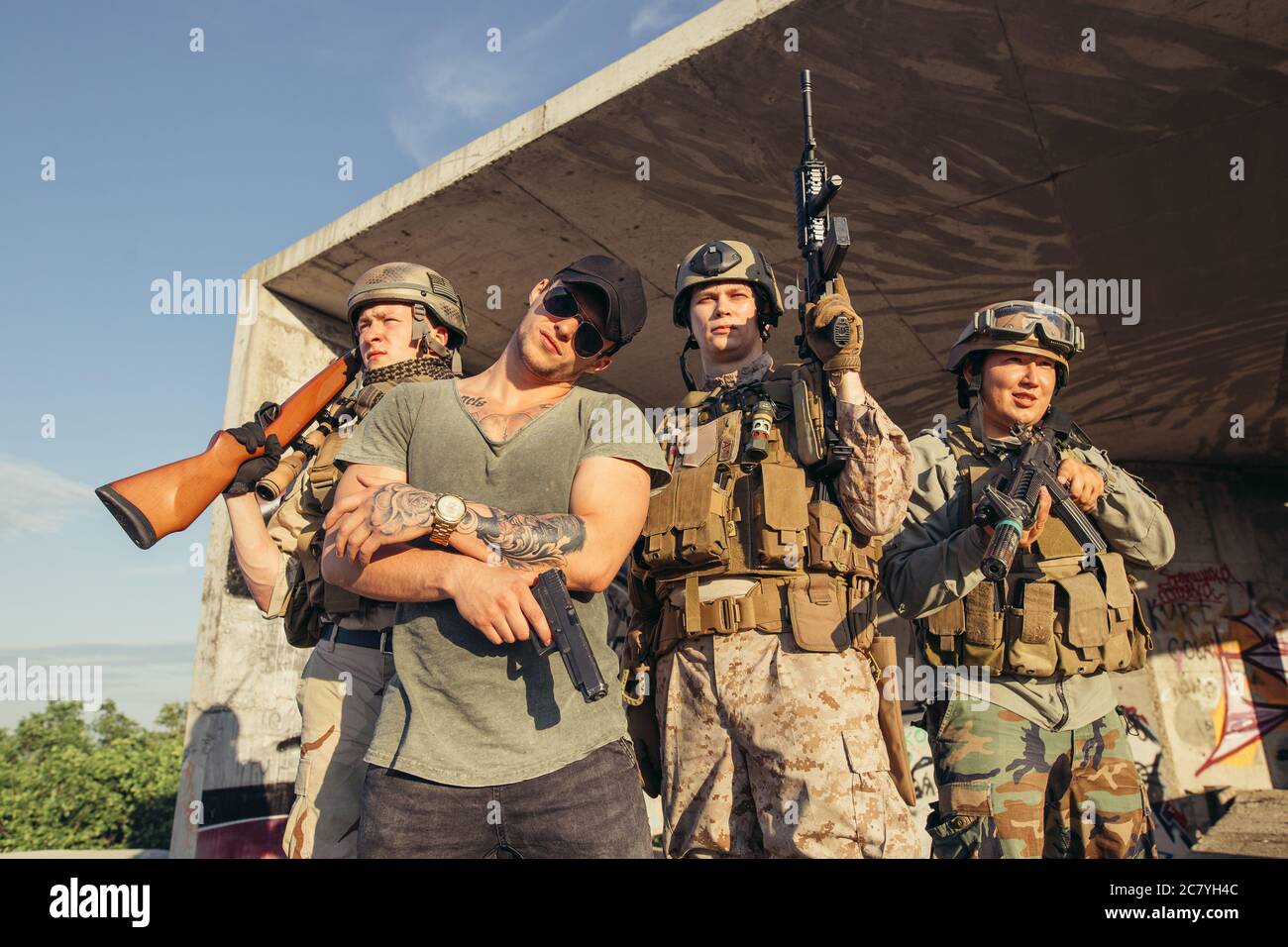 portrait of soldiers group with jungle and desert camouflage Stock ...