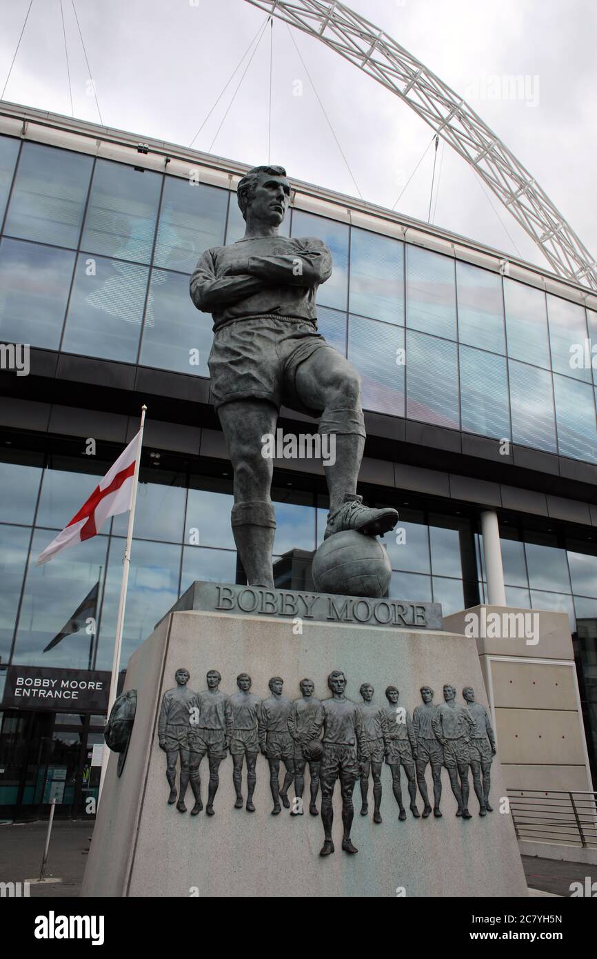Wembley, UK. 19th July, 2020. The Bobby Moore Statue on the concourse ...