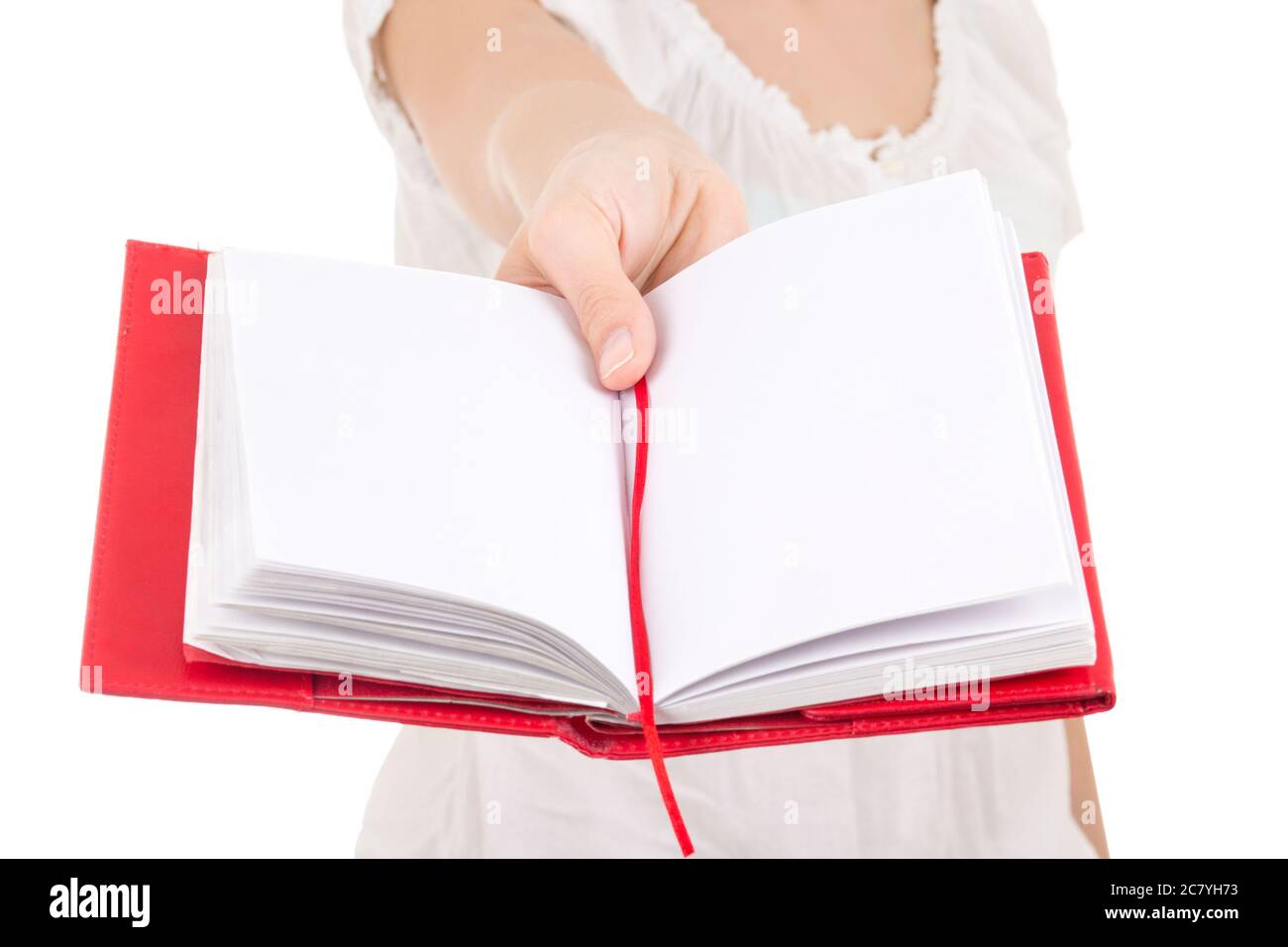 woman giving blank notebook isolated on white background Stock Photo ...