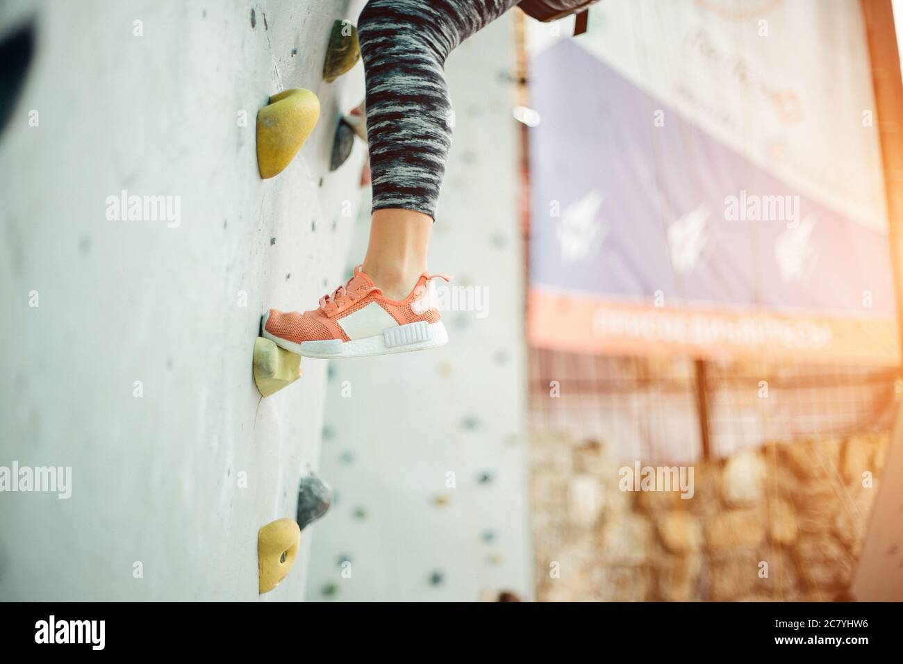 Close-up image of female foot on climbing wall Stock Photo - Alamy