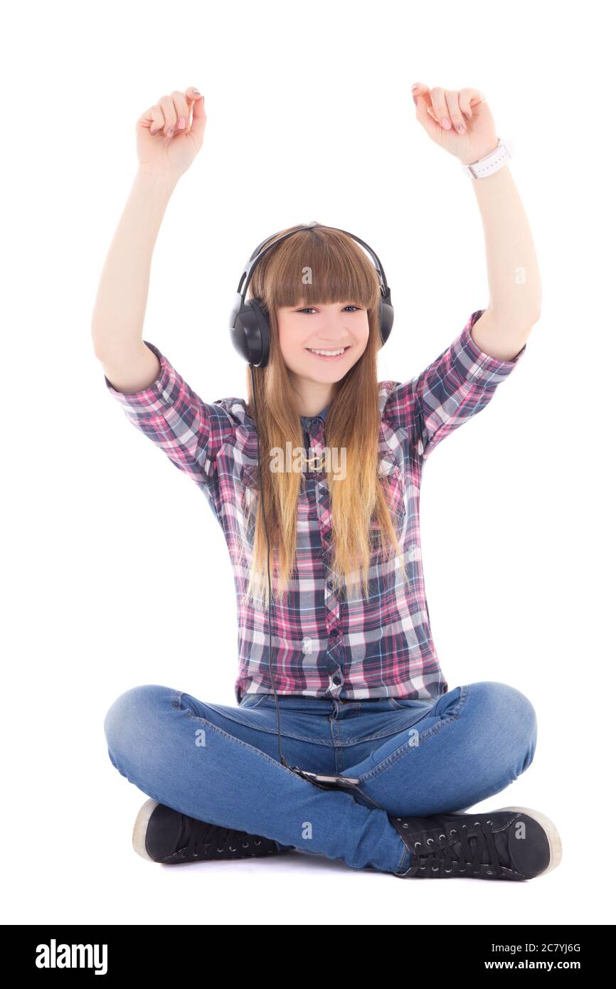 cute teenage girl listening music and dancing isolated on white ...