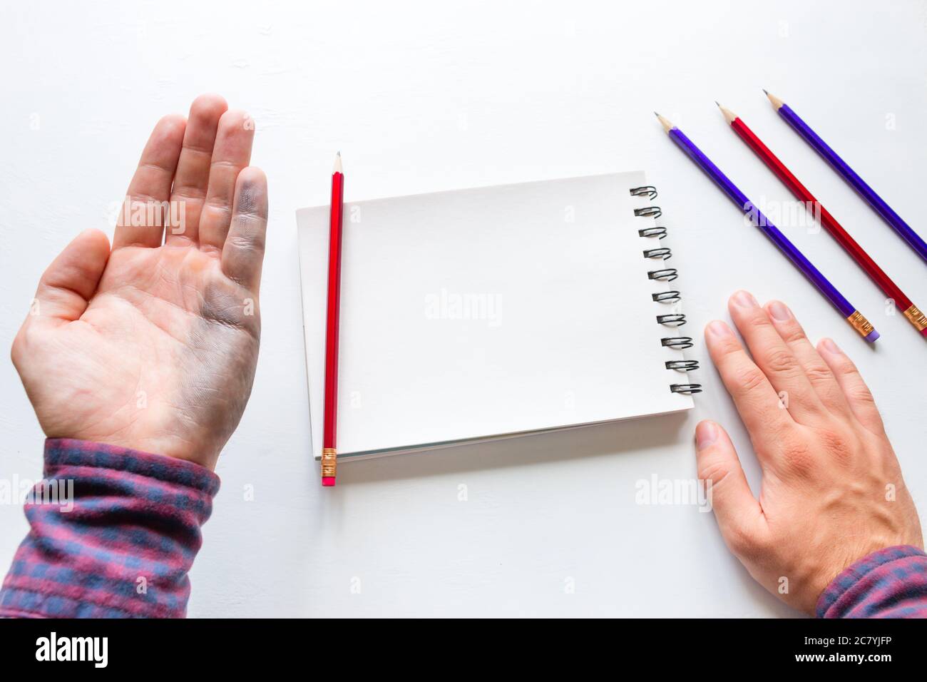 Left-handed man shows a dirty hand after writing mockup Stock Photo - Alamy