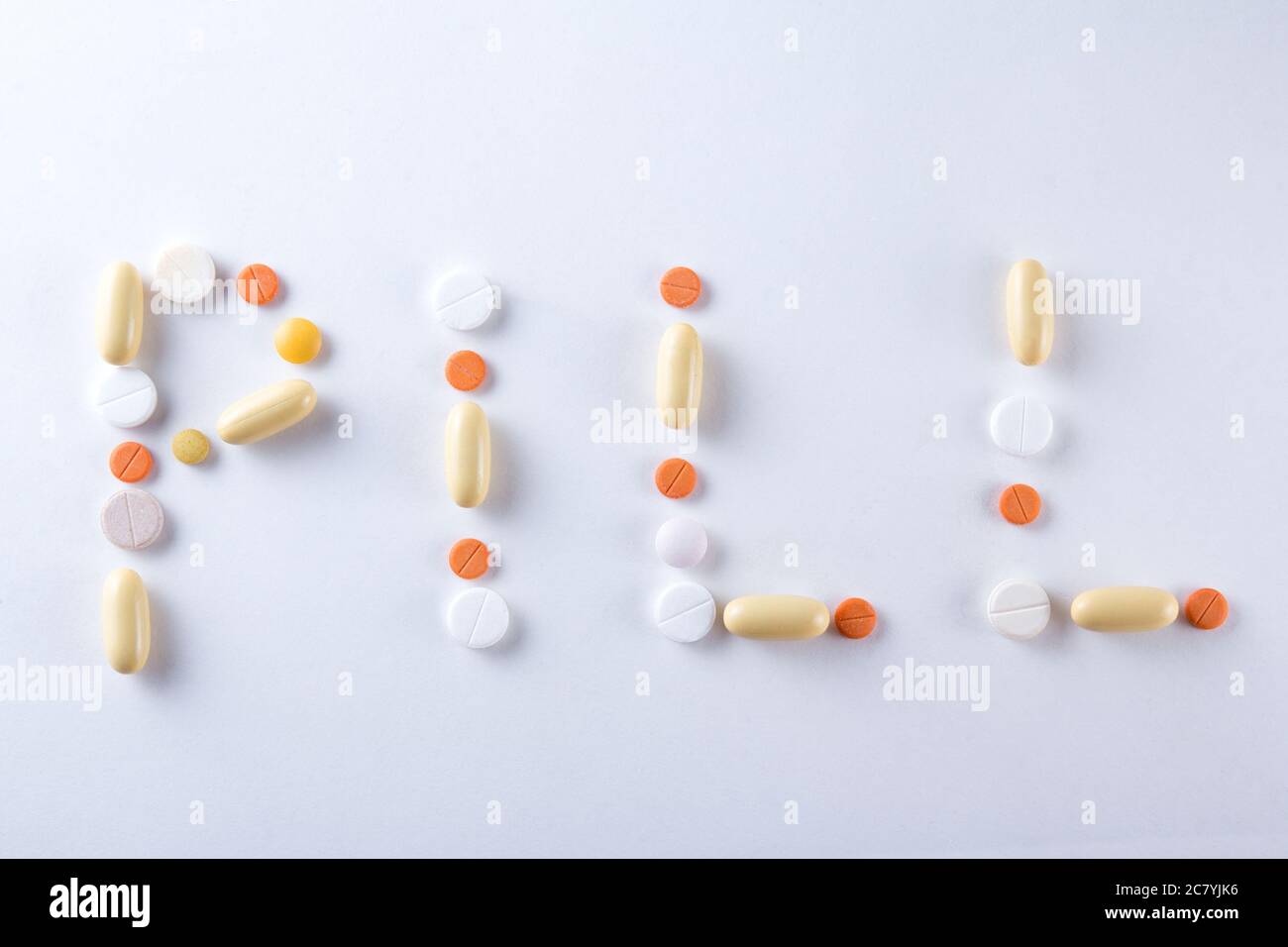 pill word text made of colorful tablets, pills and capsules over white ...
