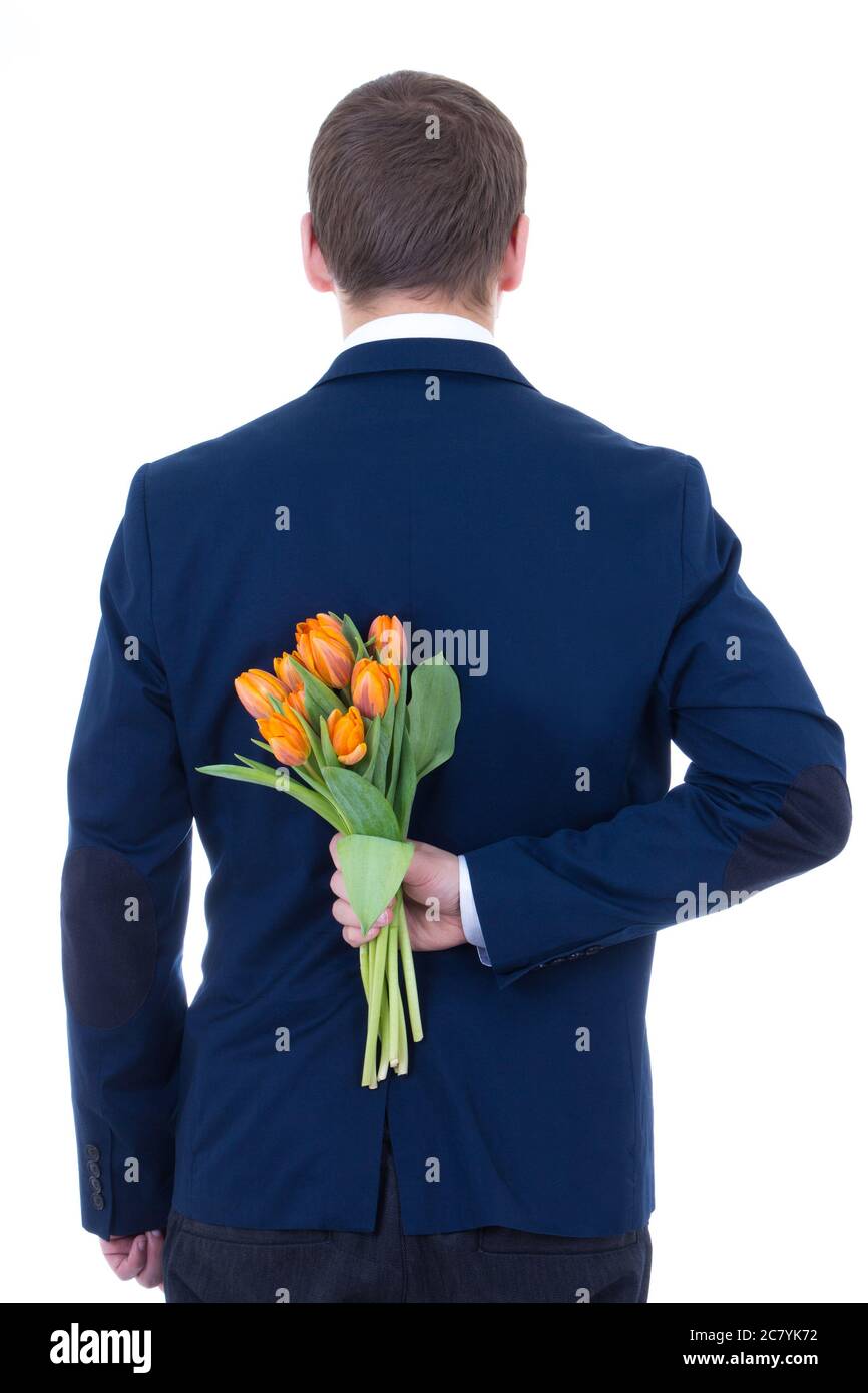 Husband hiding flower behind back hi-res stock photography and images ...
