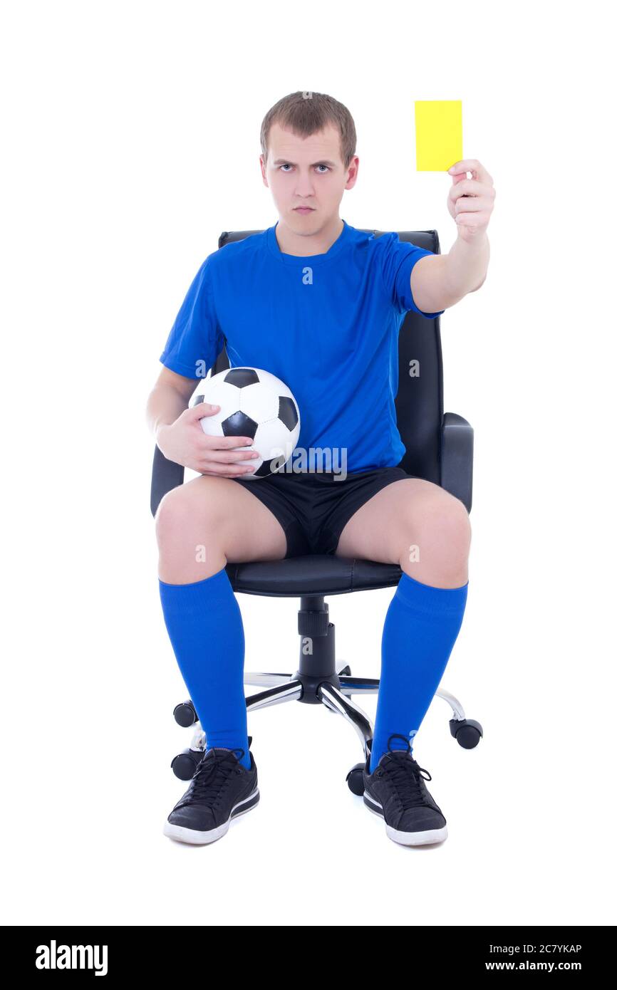 angry man in uniform watching football game and showing yellow card ...
