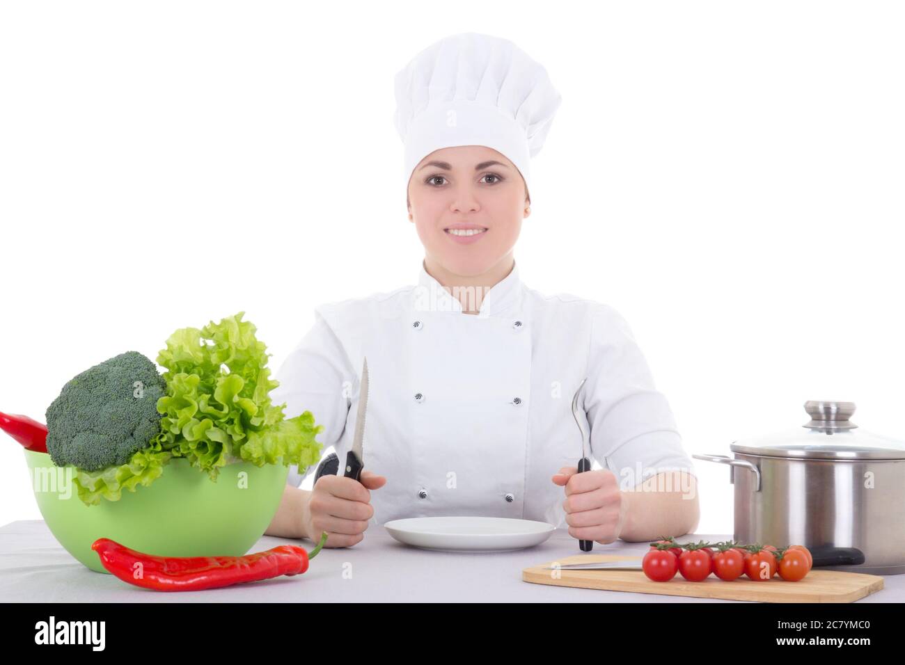 portrait of young attractive cook woman in uniform on the kitchen Stock ...