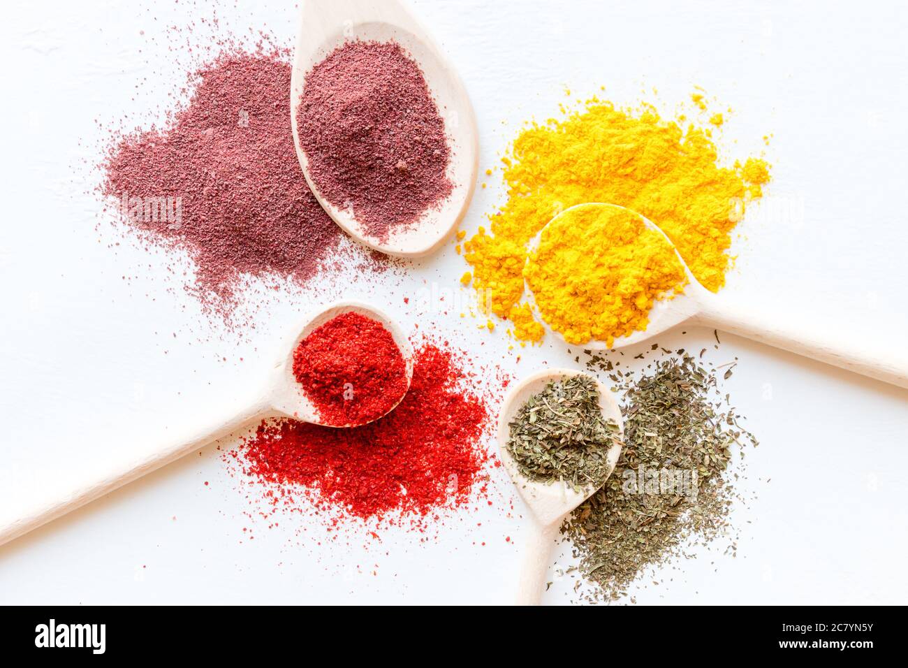 colorful spices close up on a white background Stock Photo - Alamy