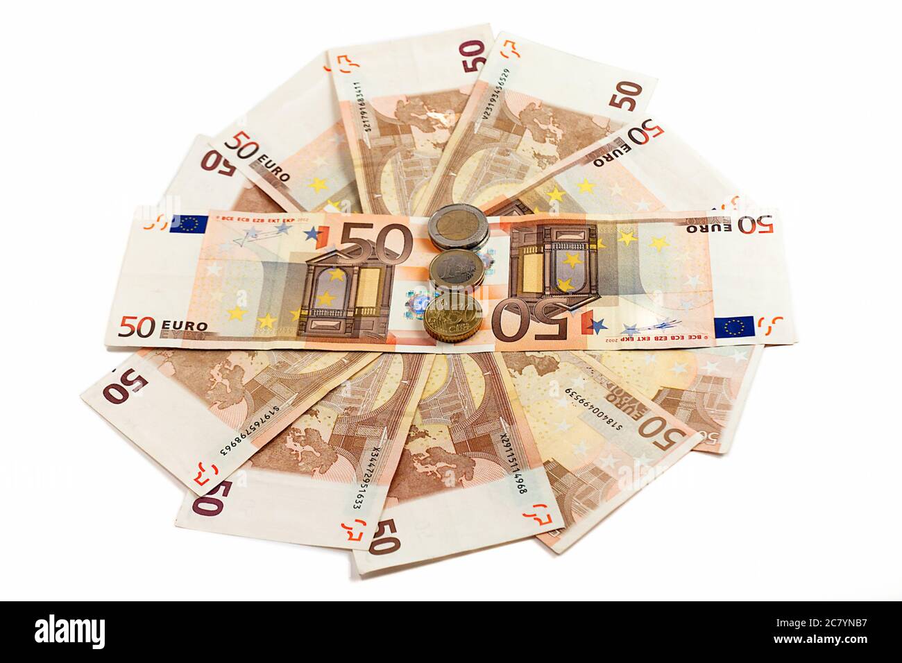 Money lies on a circle Stock Photo - Alamy