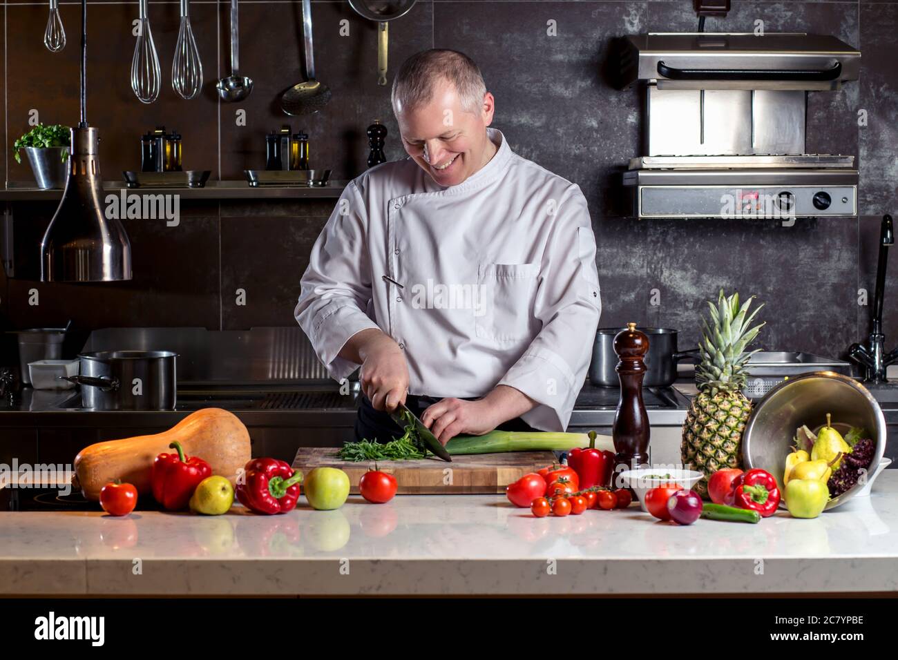 Male chef uses ingredients hi-res stock photography and images - Alamy