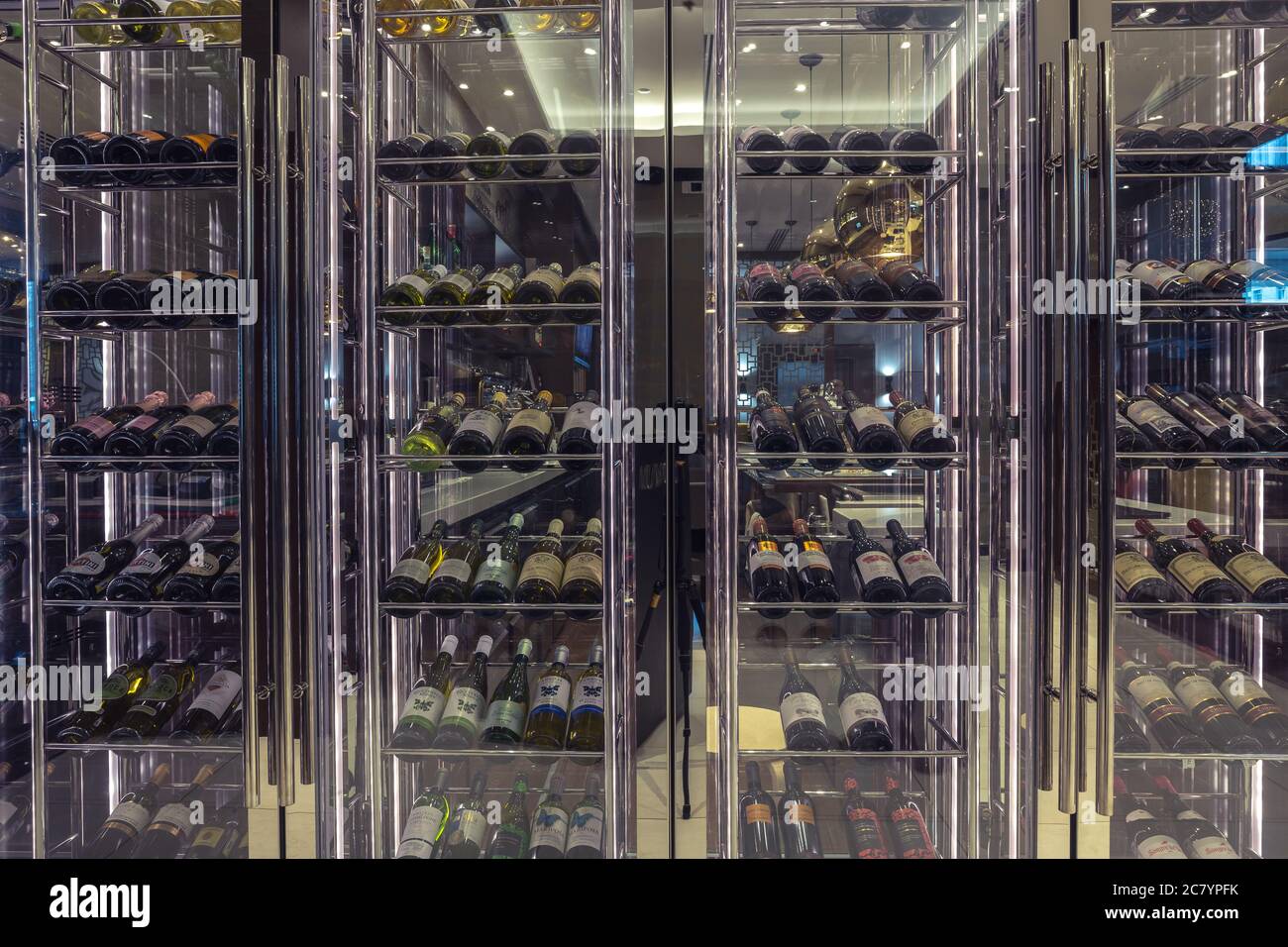 Wine cellar full of wine bottles Stock Photo - Alamy
