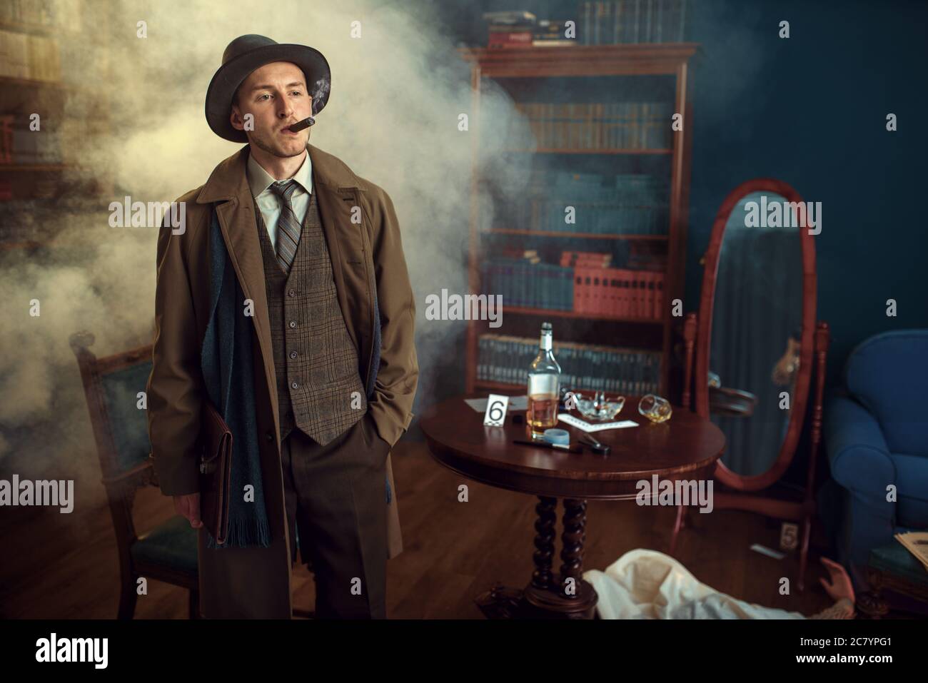 Detective with cigar holds leather folder, retro Stock Photo - Alamy